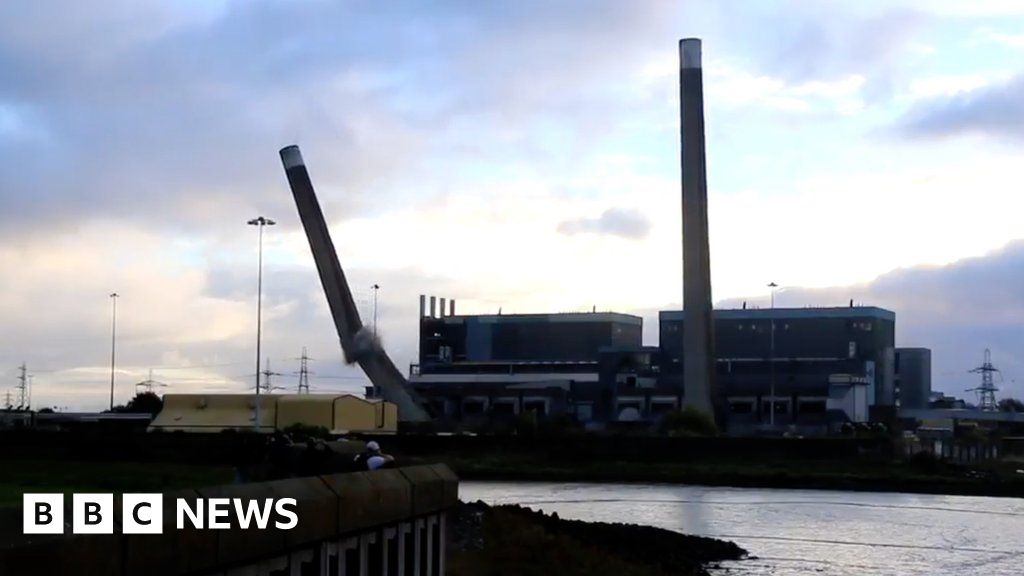 Power station chimneys come down in seconds. - BBC News
