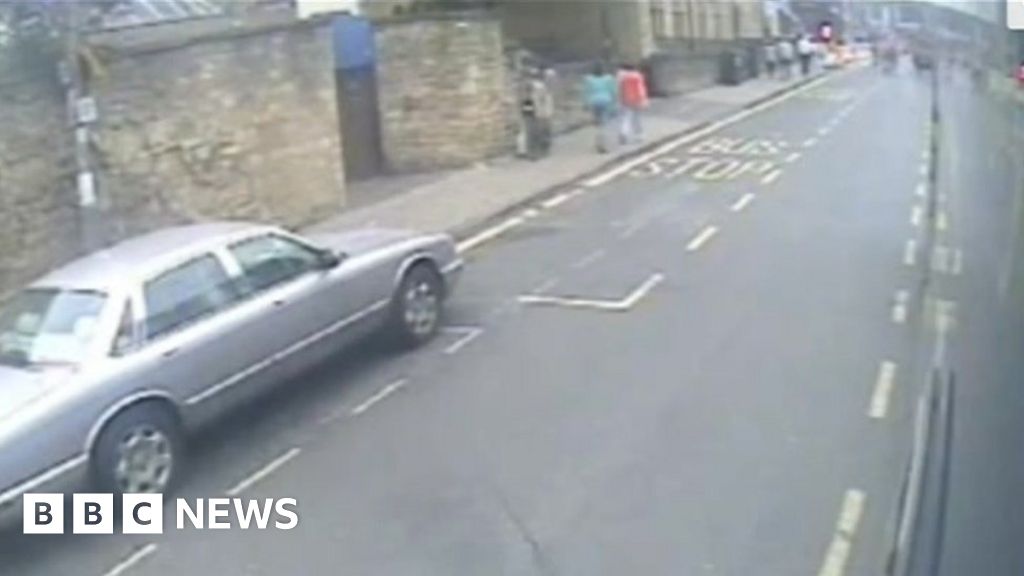 The moment a bag snatcher pulls a women to the ground