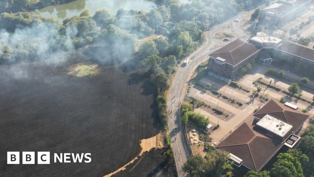 Watford homes evacuated and Lottery HQ threatened by field fire - BBC News
