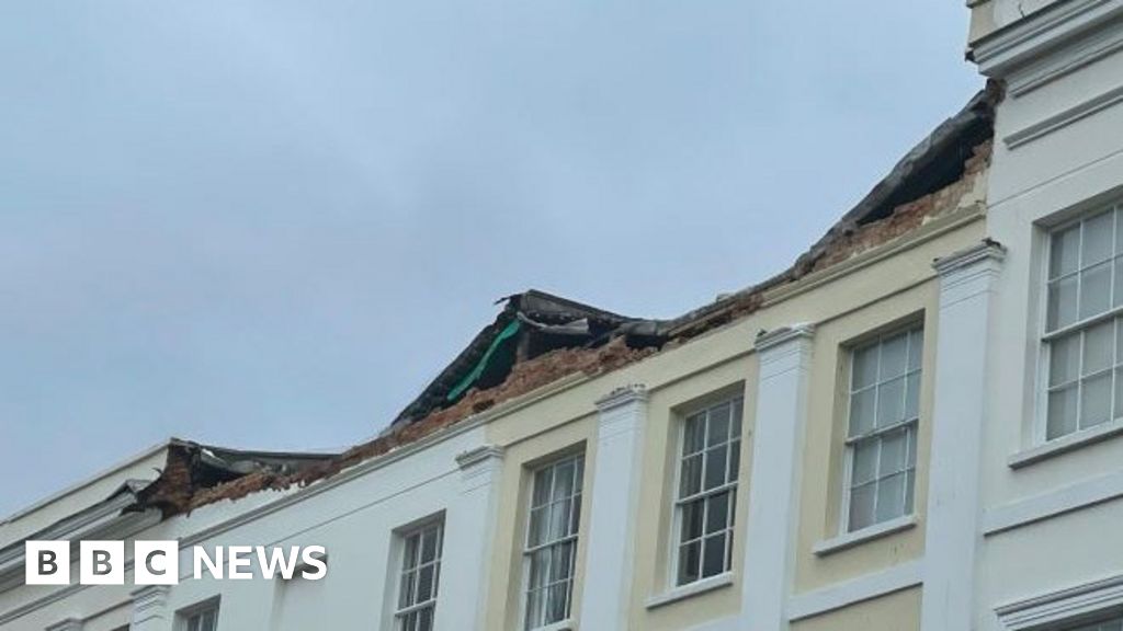 Cheltenham roof collapse smashes car windscreen - BBC News