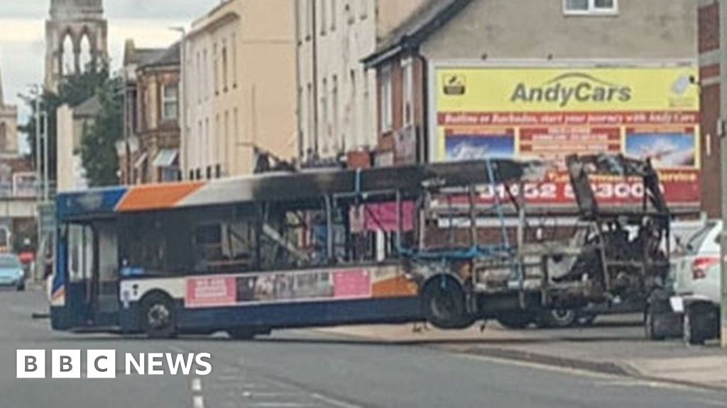 Inquiry after bus carrying passengers catches fire - BBC News