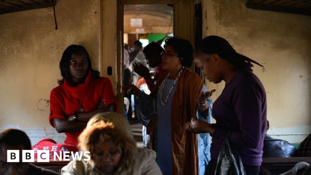 Kenya's prayer train: A commute of prayers and songs - BBC News
