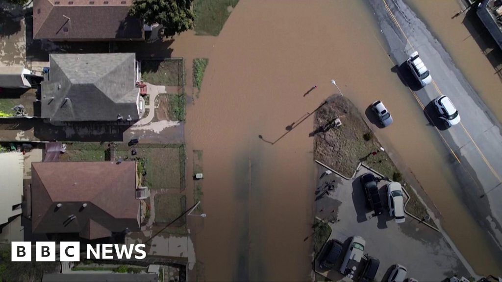 Drone footage shows nearly deserted California town under water - BBC News