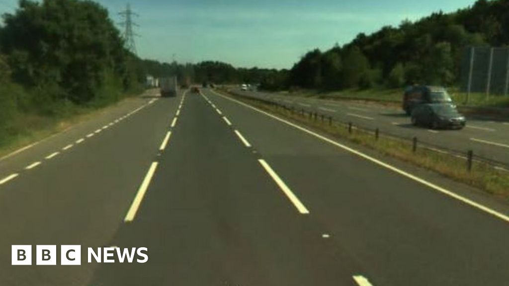 A3 Burpham: Passenger dies in crash between car and HGVs - BBC News