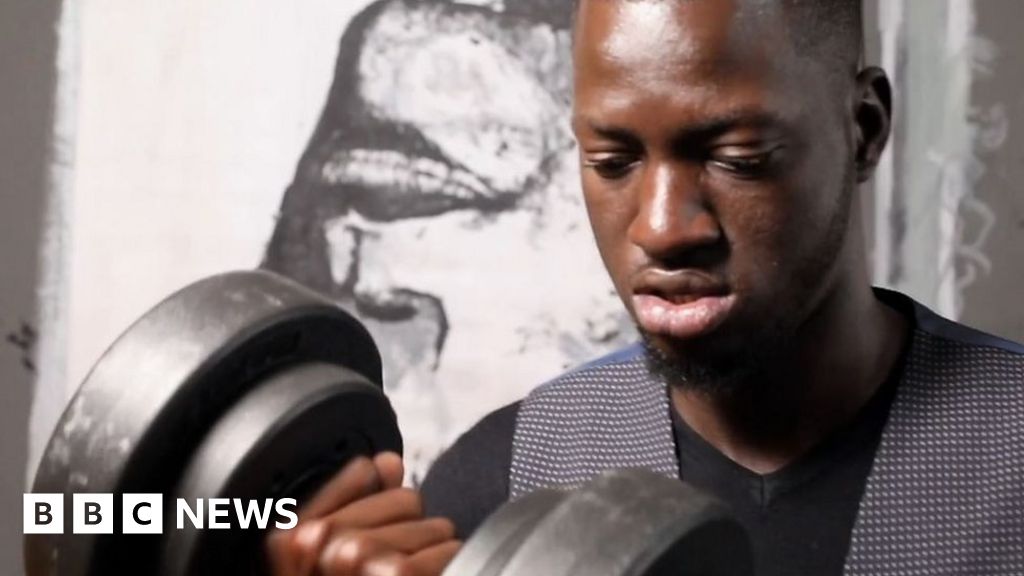 Artist Boubou paints using whatever he can get his hands on - BBC News