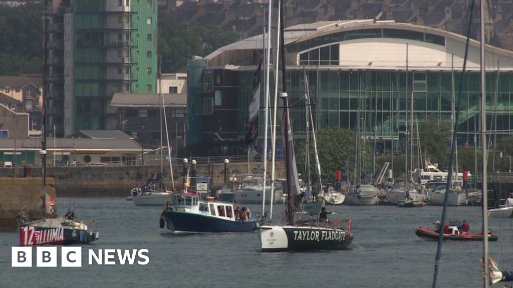 Yacht crews rescued after Atlantic storm - BBC News