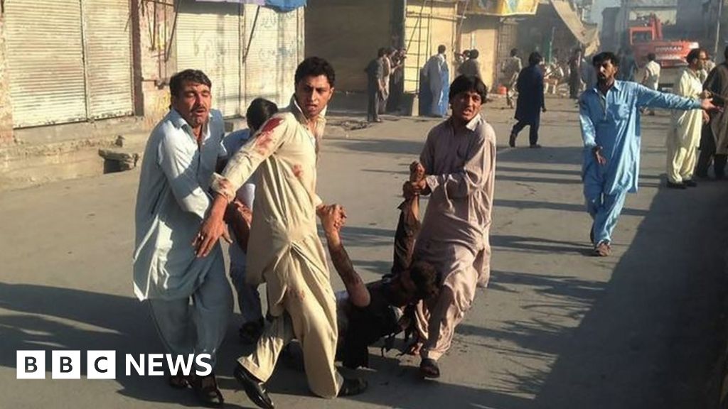 Pakistan day of violence: Scores killed and injured