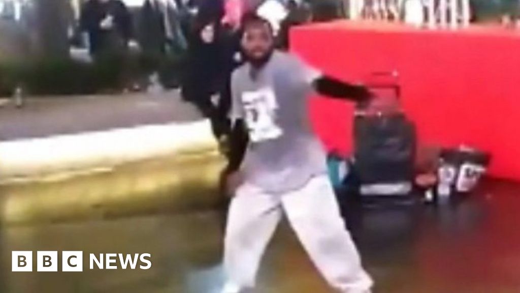 Man dances to BBC jingle in Leicester Square - BBC News