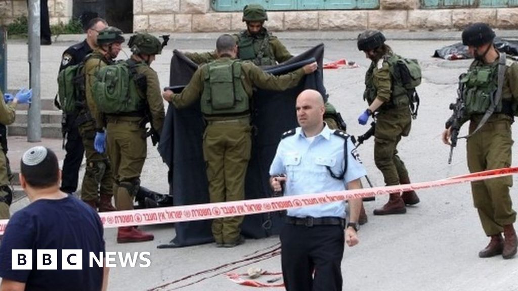 Israeli soldier 'faces manslaughter' for killing wounded attacker - BBC ...