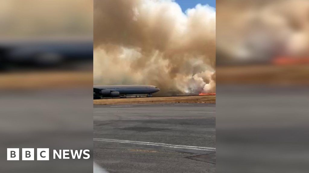 Bournemouth Airport: 'Dry weather may have caused fire' - BBC News
