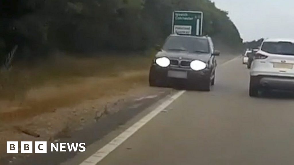 Disqualified driver filmed on wrong side of Essex A-road - BBC News
