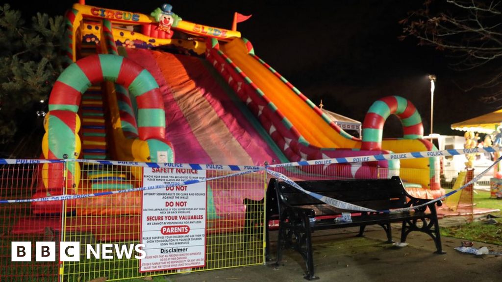 Woking fireworks: Child still in hospital after inflatable slide fall ...