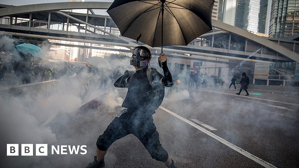China anniversary: Petrol bombs thrown during Hong Kong protests - BBC News