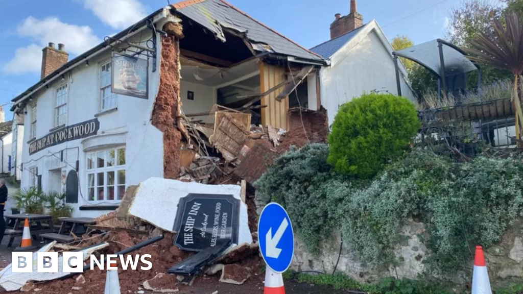 Devon pub with collapsed wall lets staff go amid rebuild - BBC News