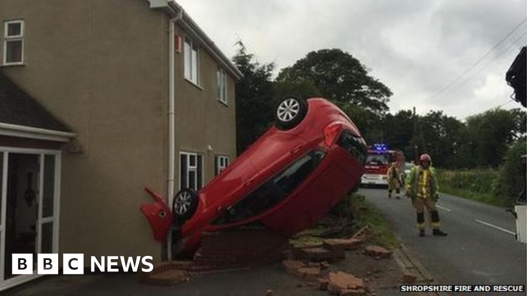 Upturned car hits Shropshire house after crash - BBC News