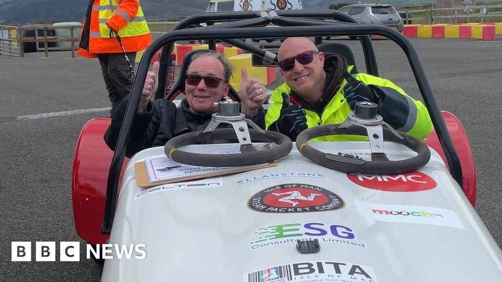 Charity track day enables blind people to drive racing cars - BBC News