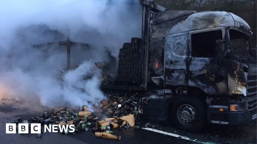 Sports drinks tins 'explode' in M6 lorry fire in Staffordshire - BBC News