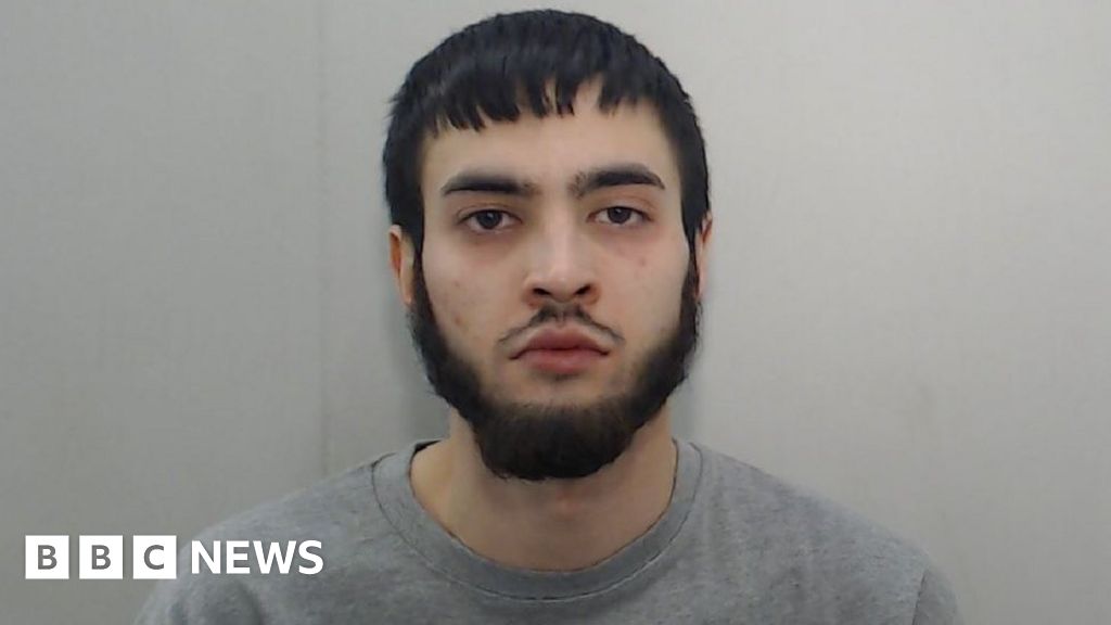 Manchester street stabbing killer jailed for at least 20 years - BBC News