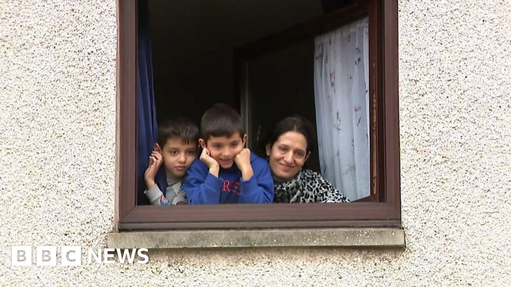 Family trapped in flooded Brechin home await rescue - BBC News