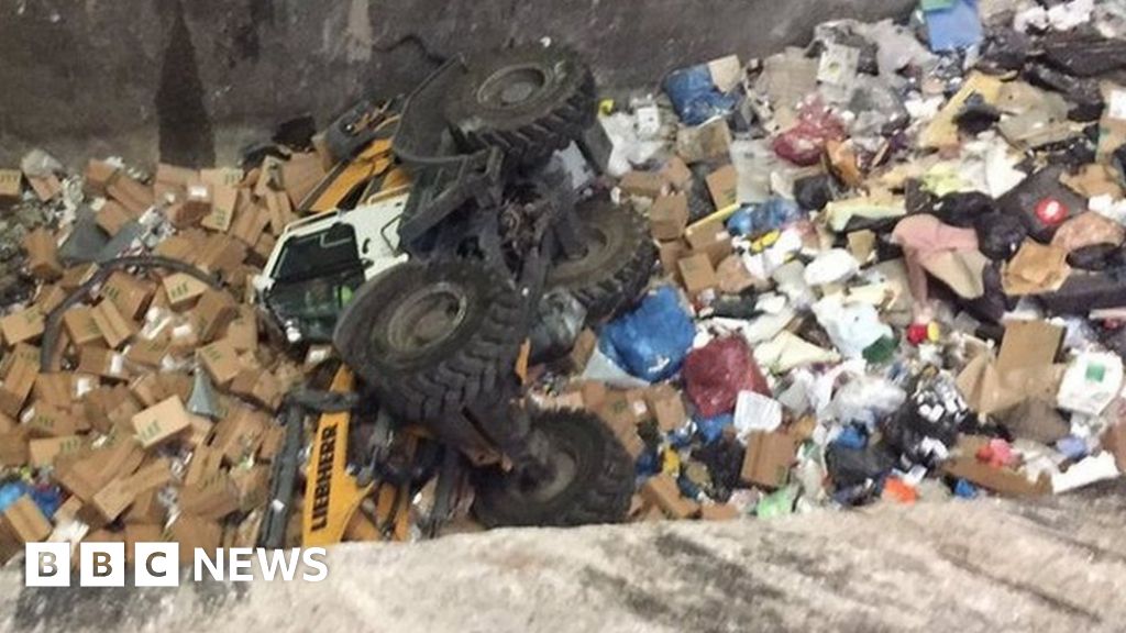 Worker hurt in 60ft digger fall in Coventry - BBC News