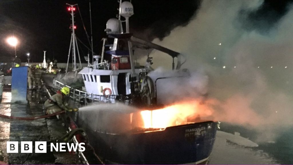 Fishermen rescued from burning boat Tranquility in Peterhead - BBC News