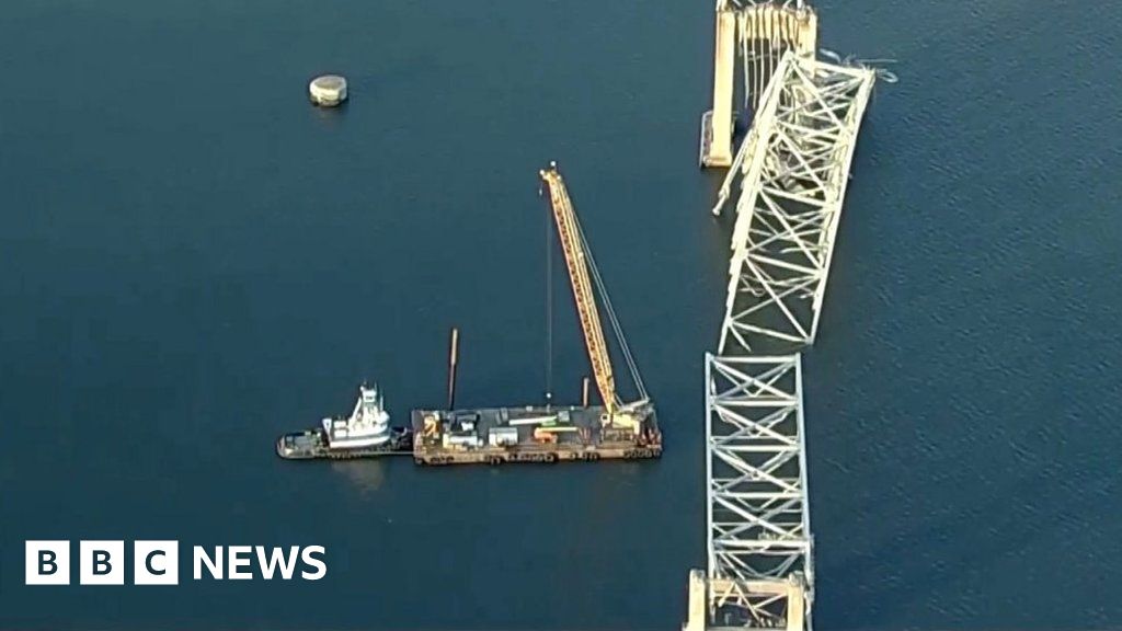 Crane arrives to clear Baltimore bridge wreckage - BBC News