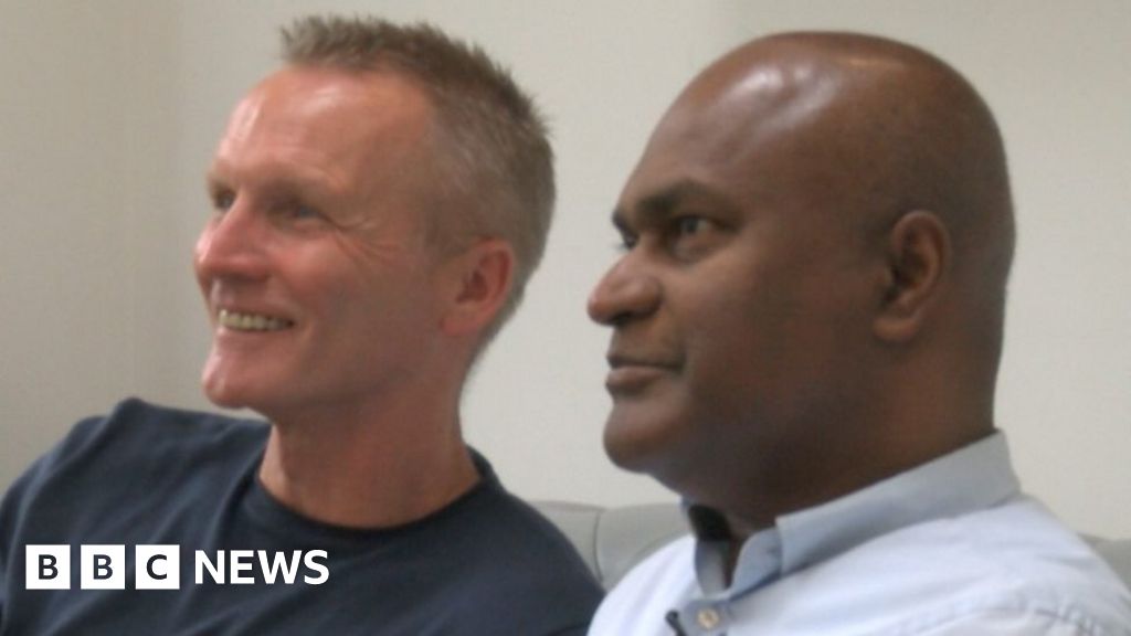 Footballer and his doctor who have both overcome cancer - BBC News