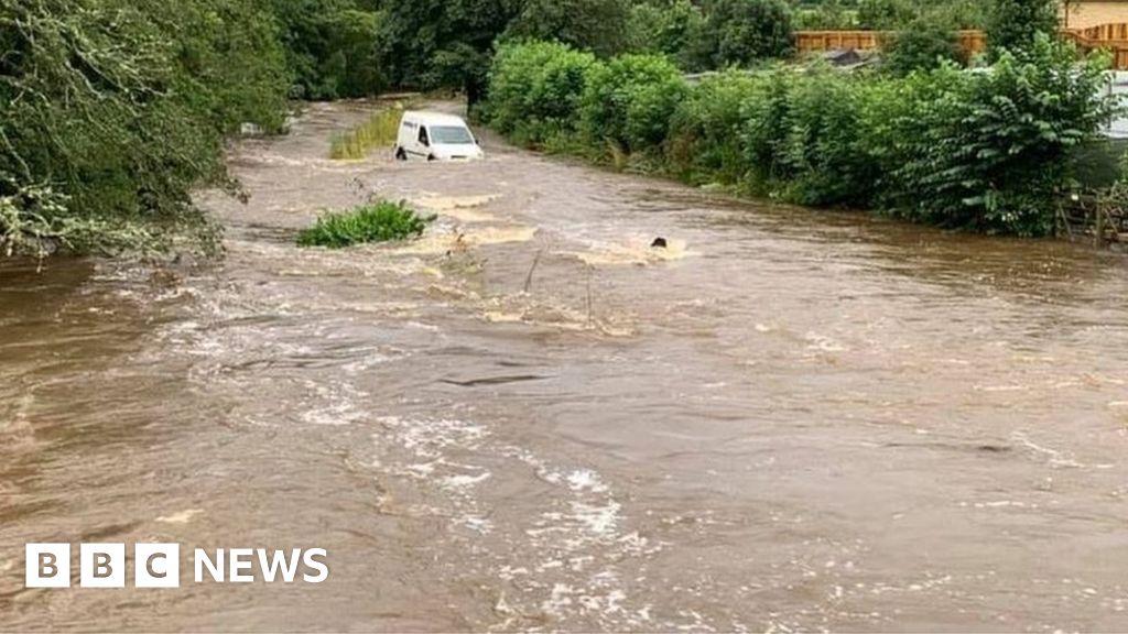 Floods in Otterburn as River Rede bursts banks - BBC News
