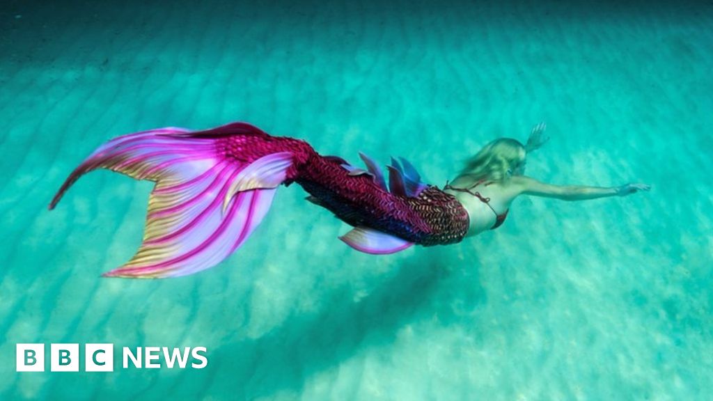 Mermaids compete in 'Merlympics' event - BBC News