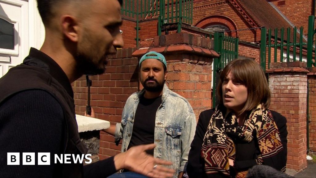 MP Jess Phillips in LGBT teaching row with protester - BBC News