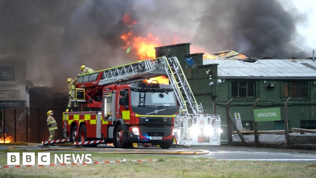 Ballymena: Firefighters leave JP Corry blaze site - BBC News