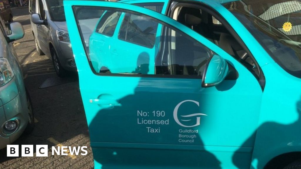 Guildford cabbies may launch legal challenge over teal taxis - BBC News