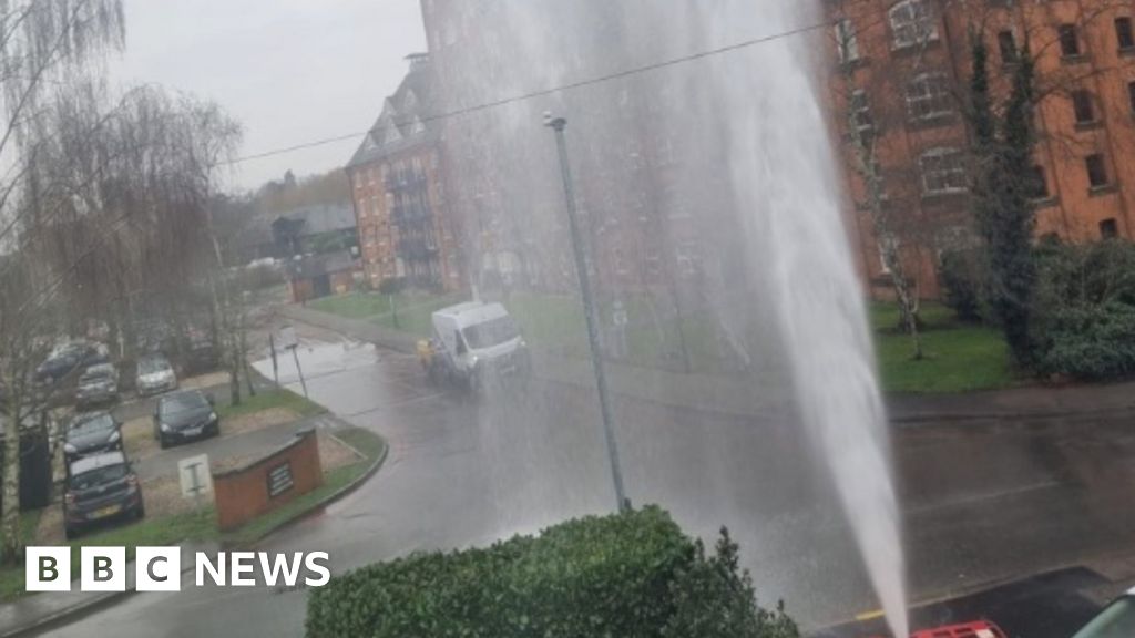 Burst water pipe causes '30-foot geyser' in street in Sheering - BBC News