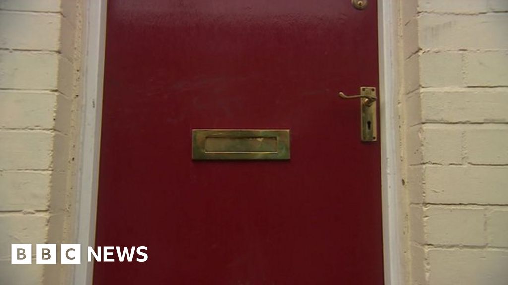 Asylum seekers' red doors repainted after claims they are targeted ...