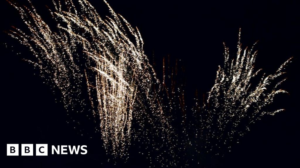 Firework explodes in crowd during Christmas switch-on - BBC News