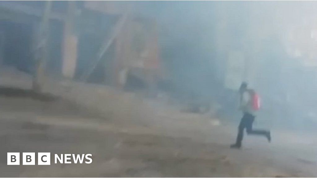 Kyiv explosions: People flee after blast hits building