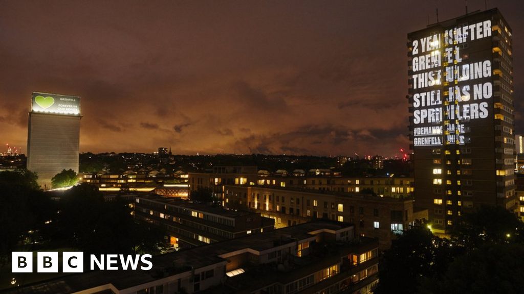 Grenfell survivors project messages on 'unsafe' tower blocks - BBC News