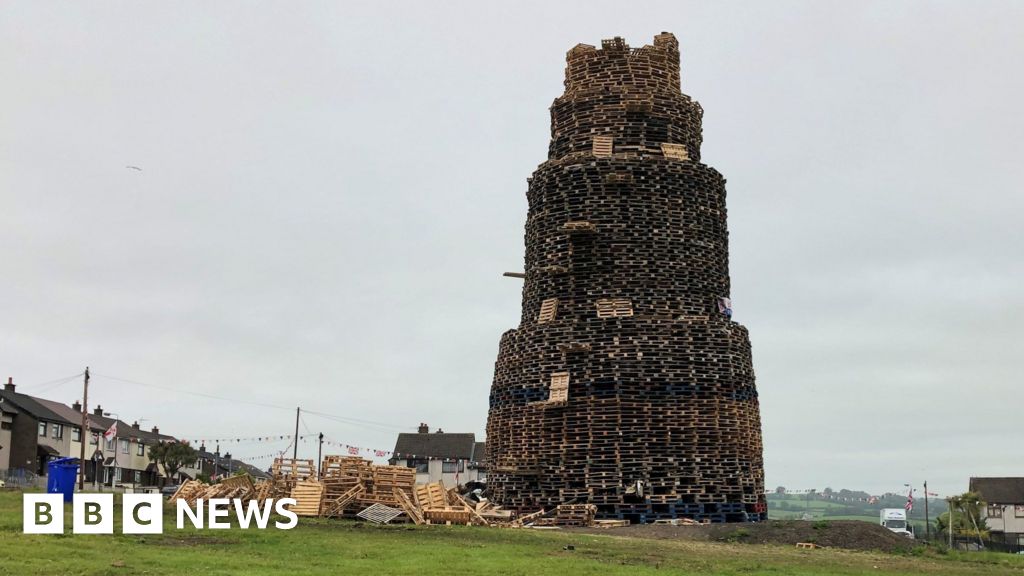 Bonfires: Council facing legal action agrees policy - BBC News