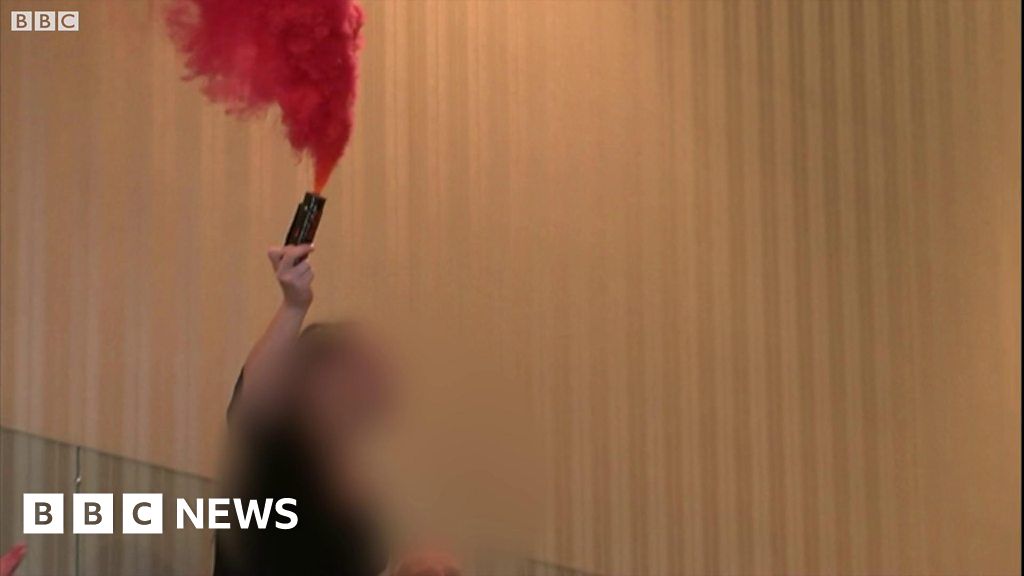 Red flare set off by protester at Bristol City Council meeting - BBC News