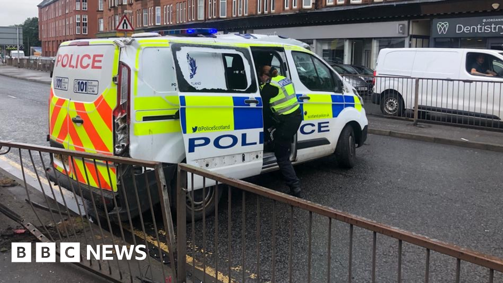 Two officers injured after police van crash - BBC News