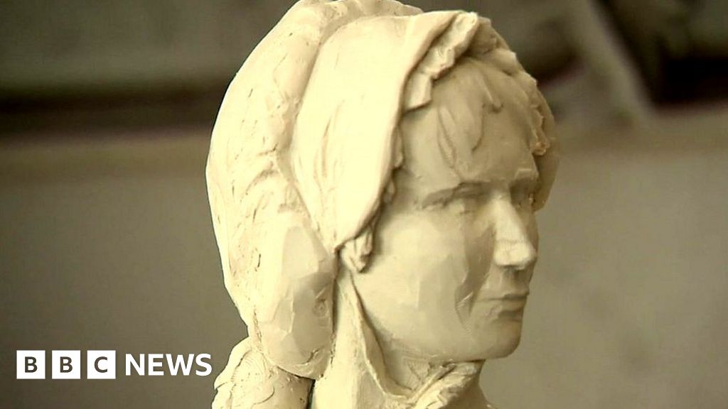 English town's memorial statue of author Jane Austen - BBC News