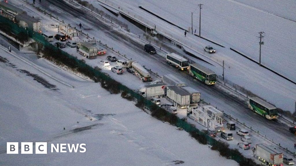 Japan snowstorm: Aerial footage shows 130-car pile-up