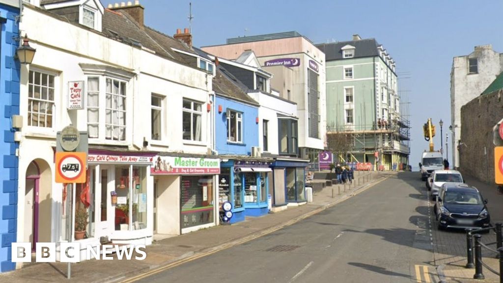 Tenby assault victim found lying in street, police say - BBC News
