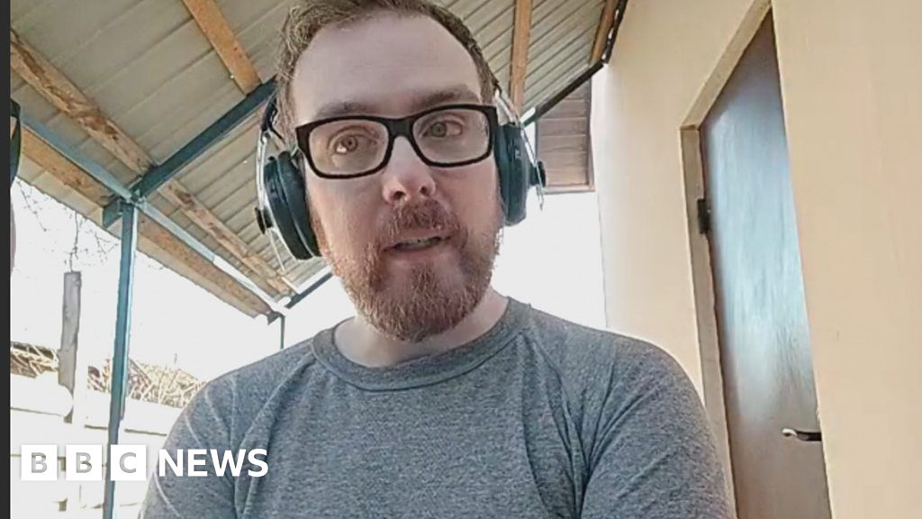 Scot in Ukraine: 'I'm scared witless... I can hear a tank' - BBC News