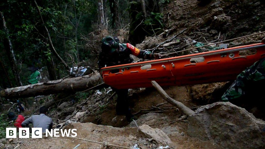 Indonesia mine collapse: Rescuers work to free miners trapped after ...