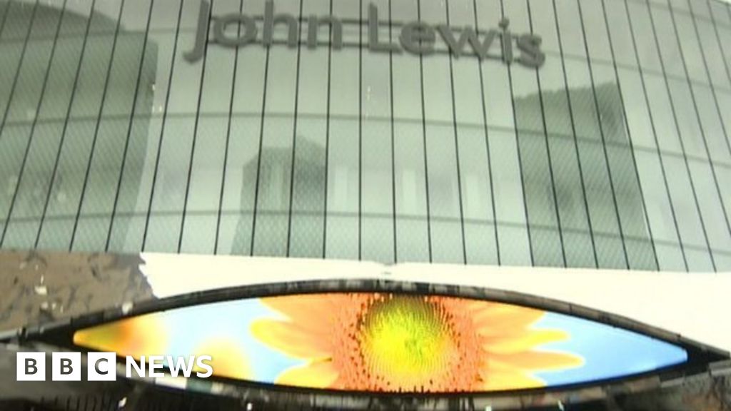 Giant advertising screens to scan public at station - BBC News