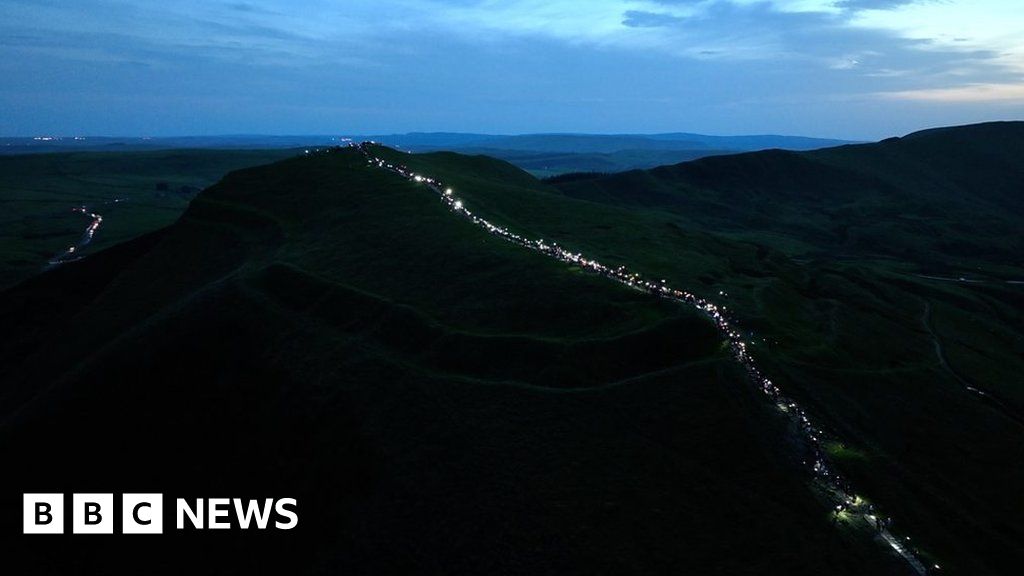 Mam Tor: Drone footage shows hundreds of illuminated head torches - BBC ...
