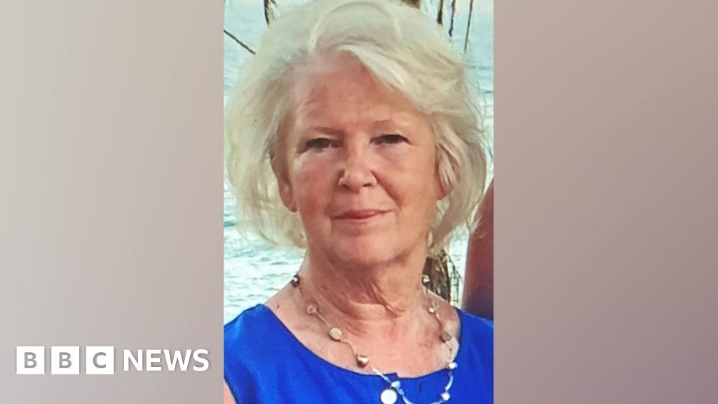 Floods: Search continues as missing woman's dead dog found