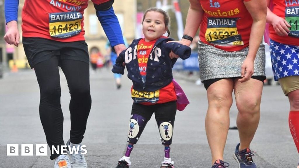 Cheers as limbless girl Harmonie-Rose completes race