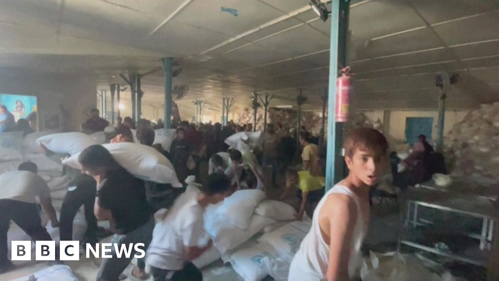 Chaos at Gaza food warehouse as people grab supplies after break-in
